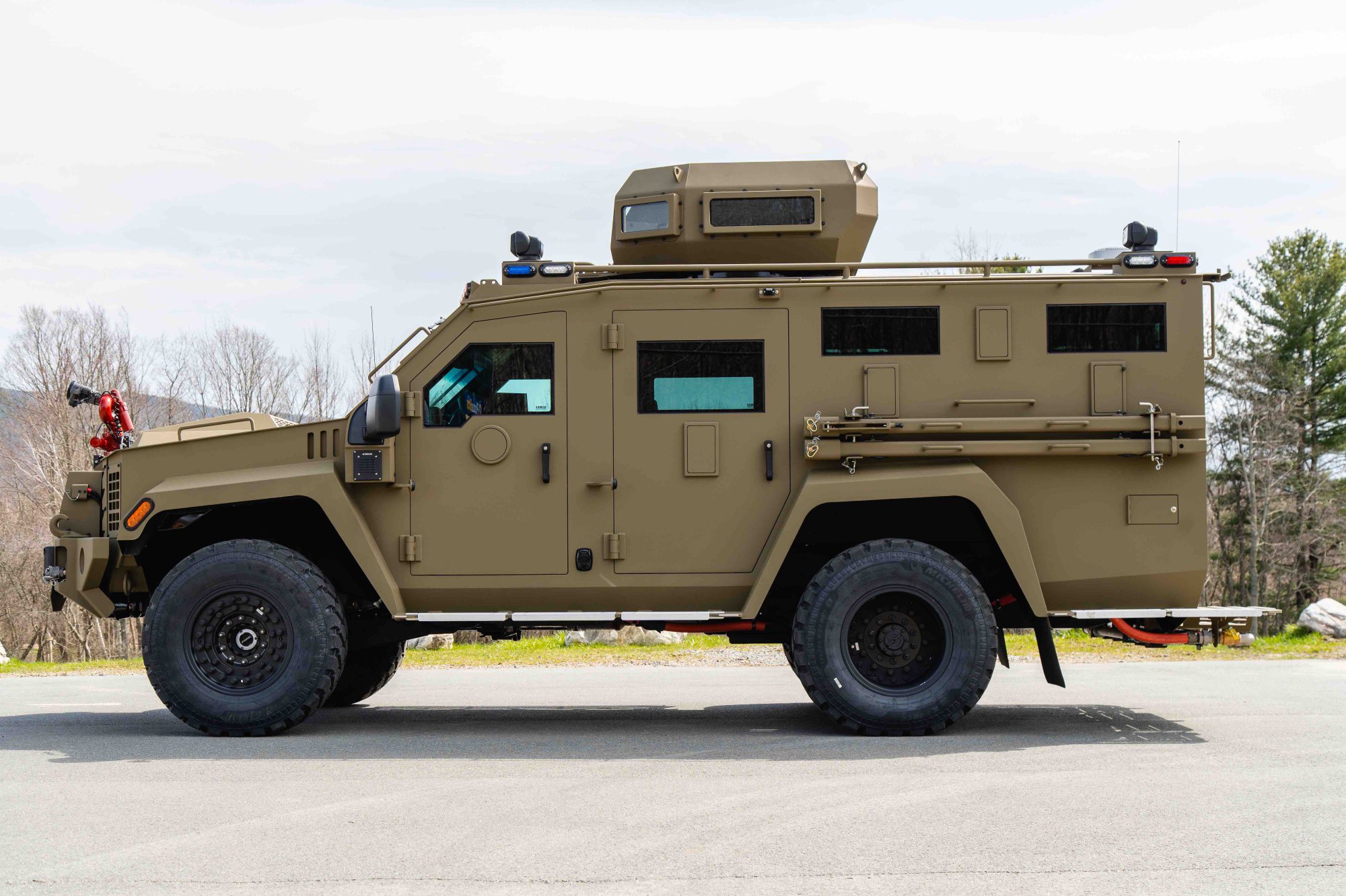 Hydraulic Ram Breaching System on Lenco BearCat: The Standard SWAT Tool ...
